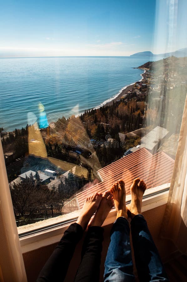 Lovers before a Large Window and Looks at the Sea Stock Image - Image ...