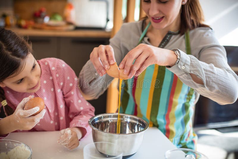 She loves baking with mom stock photo. Image of bake - 175173564