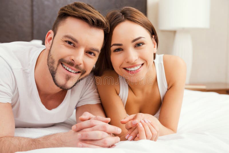 Loving couple in bed. stock image. Image of happiness - 49634329