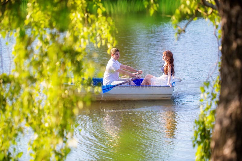 Couple on Romantic Boat Ride. Stock Photo - Image of care, couple: 24041618