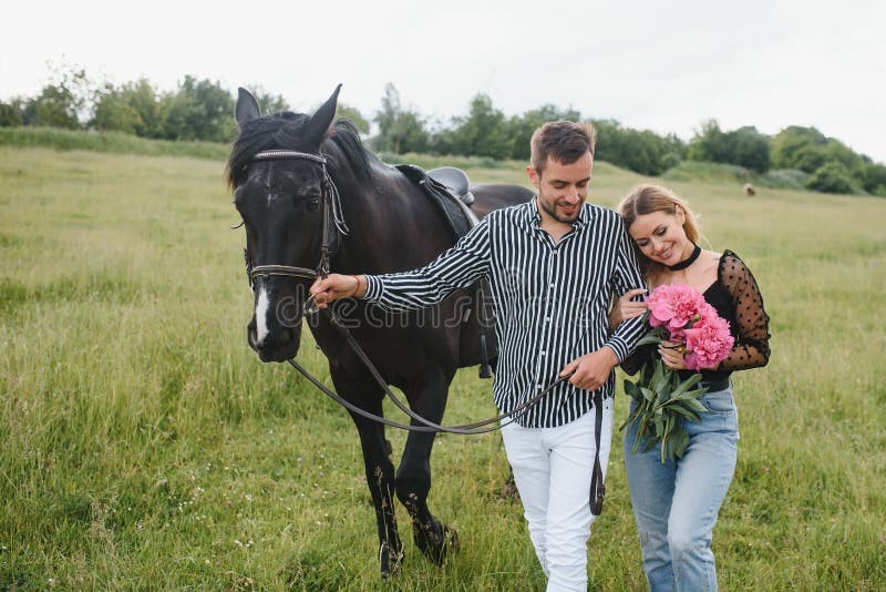 Loving Couple with Horse on Ranch Stock Photo - Image of love, woman ...