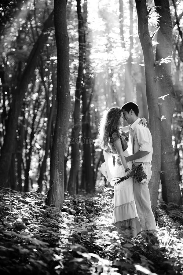 Loving Couple Kissing in the Forest Stock Image - Image of ...