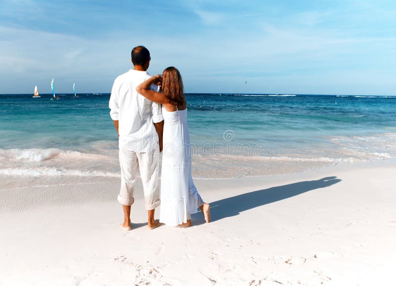 Loving Couple Looking the Ocean Stock Image - Image of breeze, loving ...