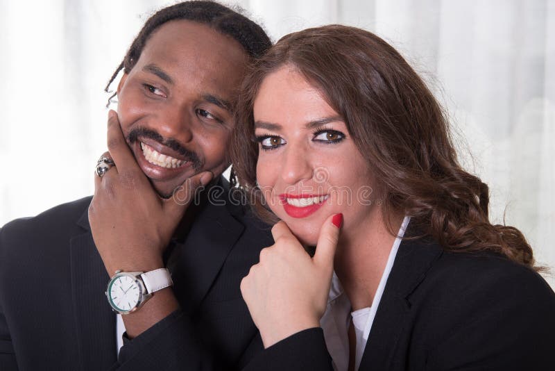 Loving Couple is Looking at Something Stock Photo - Image of black ...