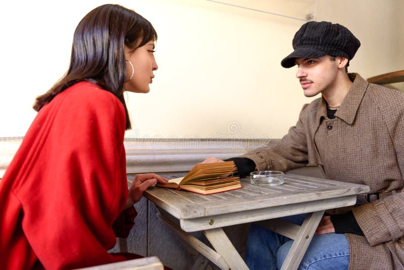 Loving Couple are Reading a Book in the Bar Stock Image - Image of book ...