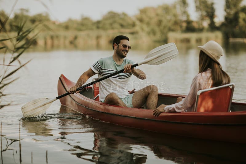 Couple rowing boat stock image. Image of remote, boyfriend - 7329835