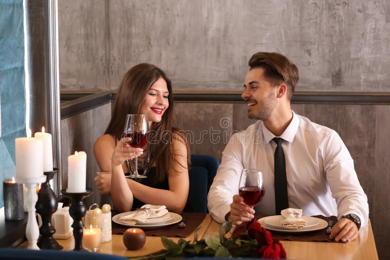 Loving Couple Sitting at Table in Restaurant on Romantic Date Stock ...