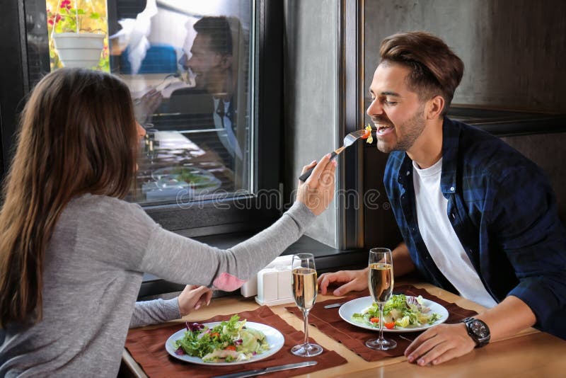 Loving Couple Sitting at Table in Restaurant on Romantic Date Stock ...