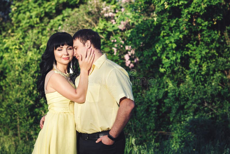Loving Couple is Standing in Park in Summer and Hugging Stock Image ...