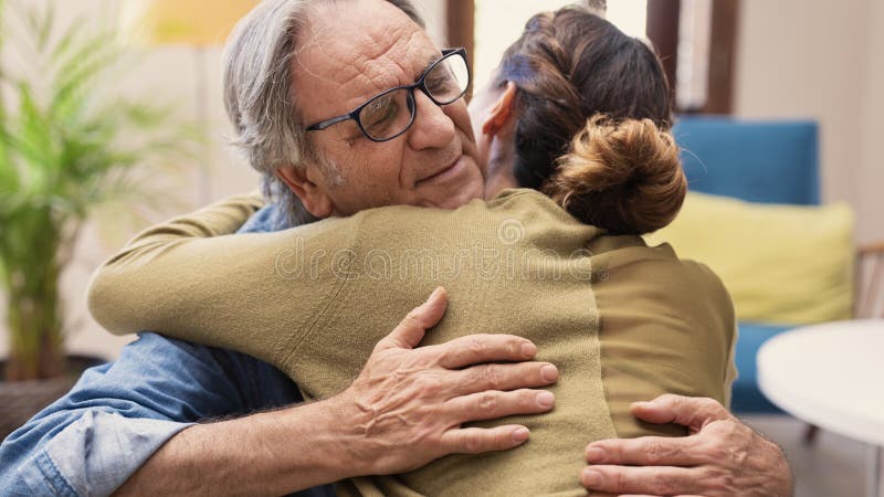 A loving hug at home stock image. Image of happiness - 285387693