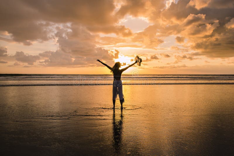 A Loving Life Woman at the Beach Stock Image - Image of beach, hand ...