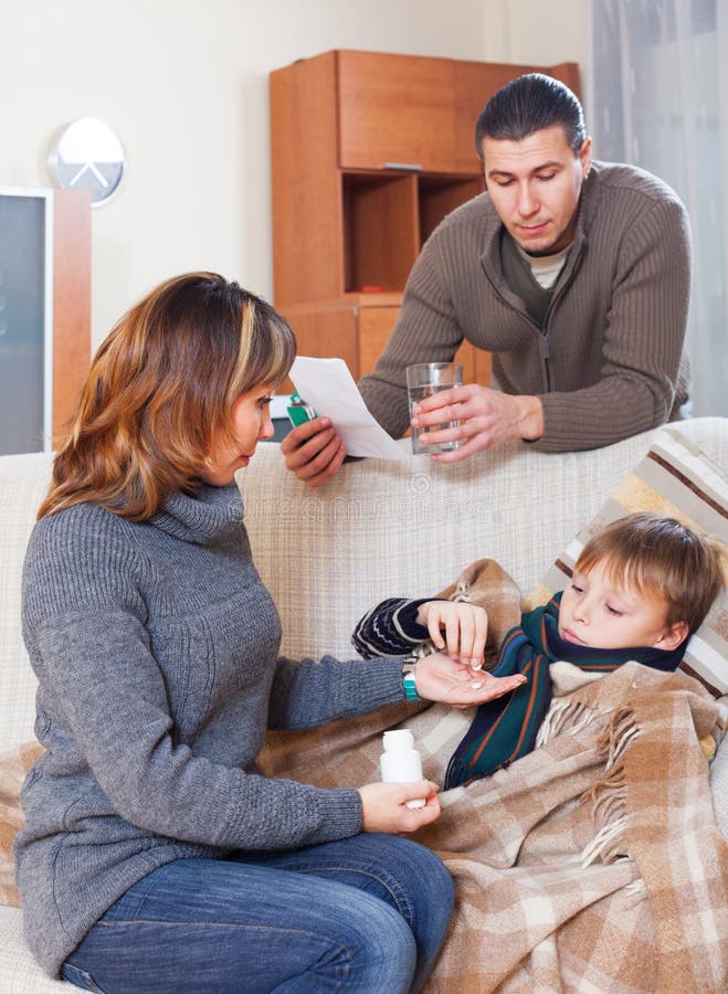 Loving Parents Caring for Boy Stock Photo - Image of parenthood, adults ...