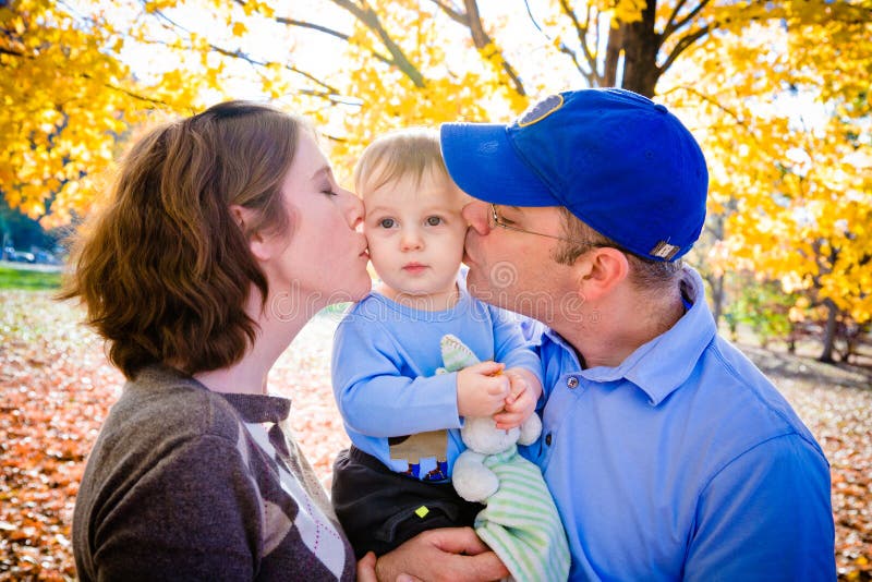 Loving Parents and Son stock photo. Image of daddy, cheerful - 27732436