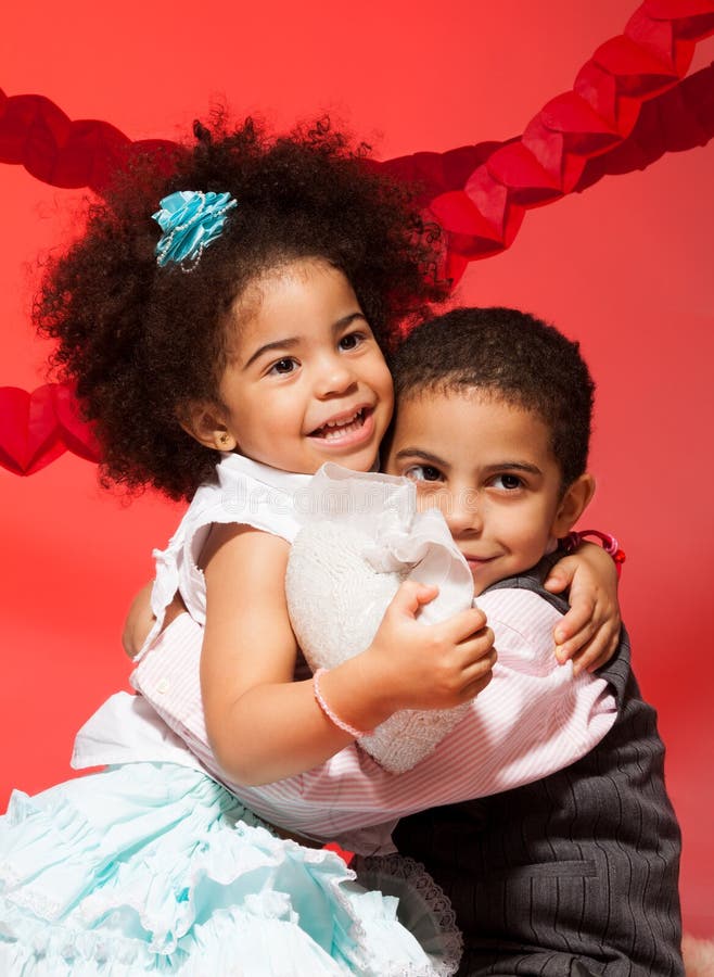 Loving siblings hugging stock photo. Image of lifestyle - 27979590