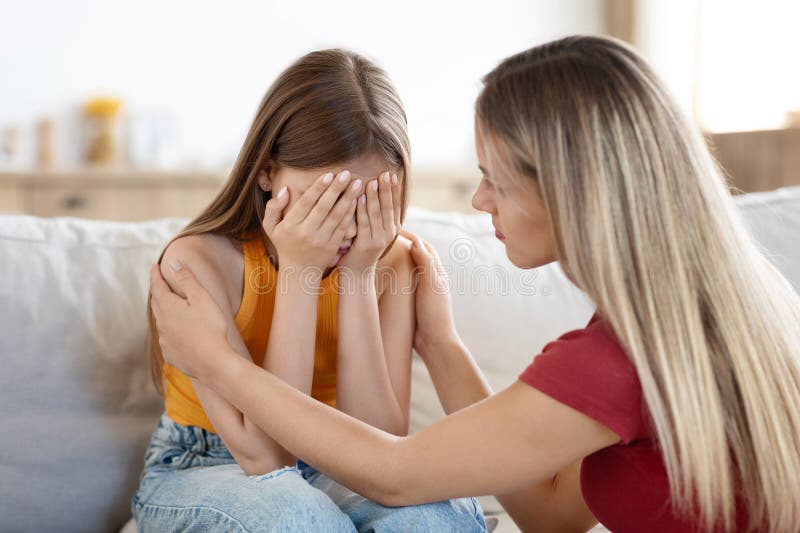 Loving Supportive Blonde Mother Supporting Crying Daughter Stock Image - Image of crying, child ...