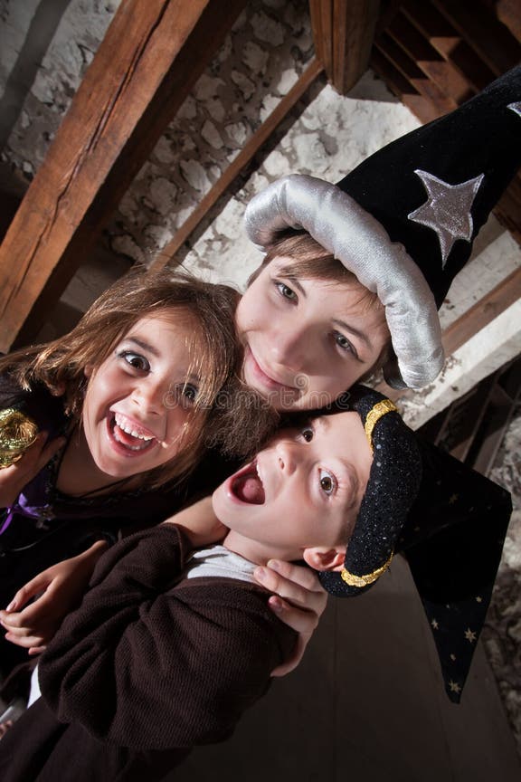 Loving Wizard Siblings stock photo. Image of joking, brother - 28555752
