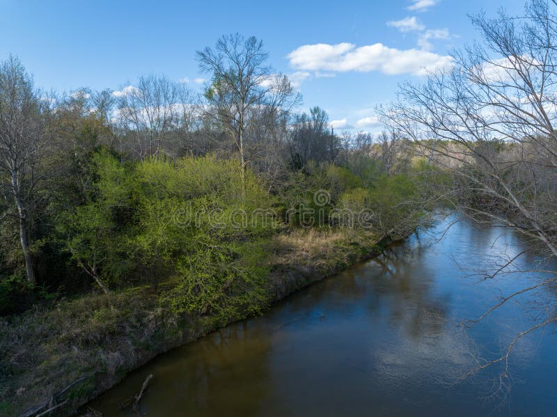 Low Aerial Above a River in Spring Stock Photo - Image of leaf, forest ...