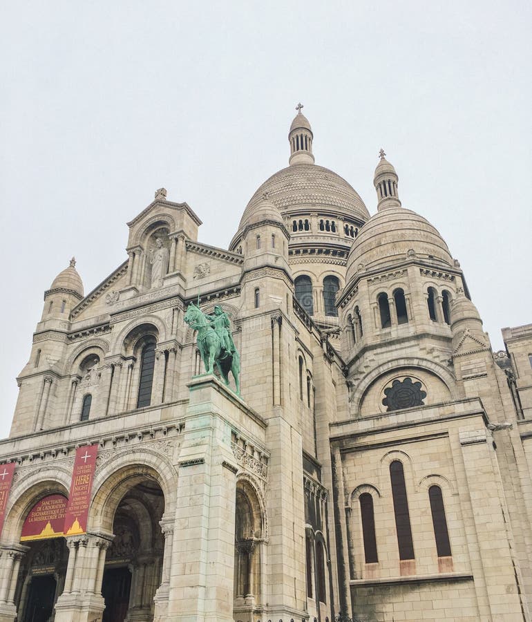 Low Angle of the Basilica of the Sacred Heart of Paris with a Gray Sky ...