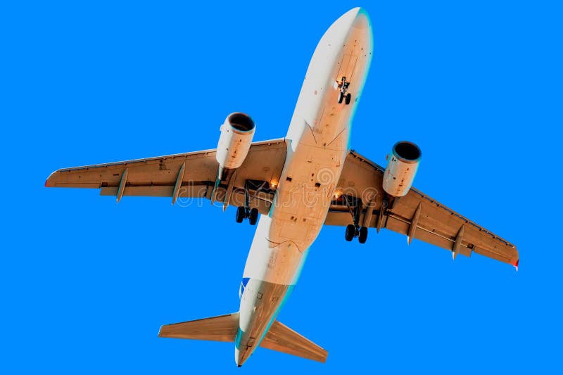 Low Angle of the Bottom View of the Landing Plane in Blue Sky Stock ...