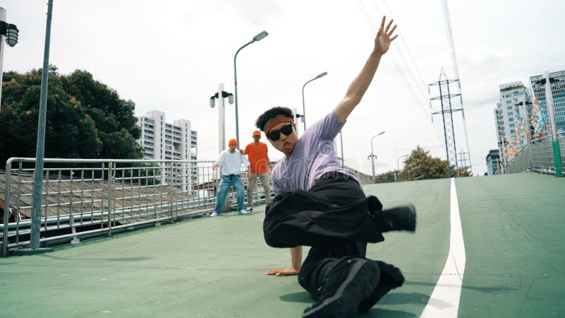 Low Angle Camera of Dancer Doing Freeze Pose while Looking at Camera ...