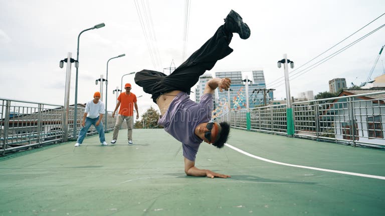 Low Angle Camera of Dancer Doing Freeze Pose while Looking at Camera ...