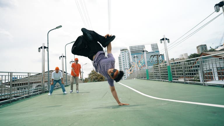 Low Angle Camera of Dancer Doing Freeze Pose while Looking at Camera ...