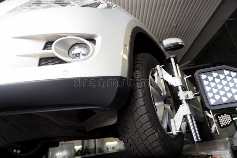 Low Angle of Car Wheel Fixed in Alignment Machine Clap Stock Photo ...