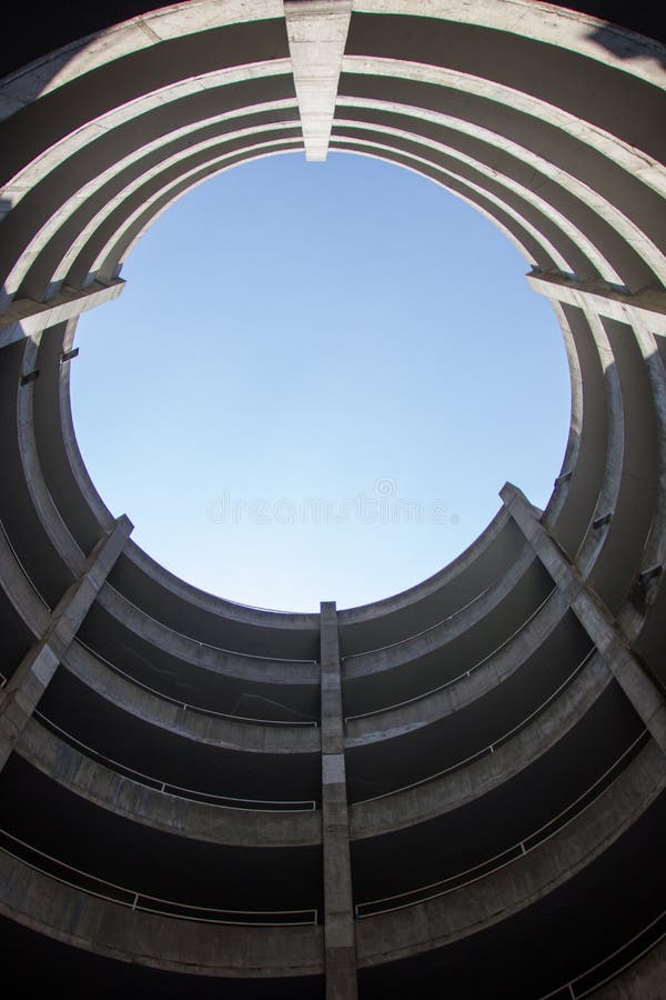 Low Angle of Circular Parking Garage Stock Image - Image of light, arch ...