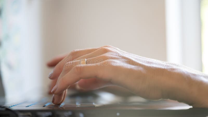 Low Angle Closeup View of Female Hands Using Laptop Computer Stock ...