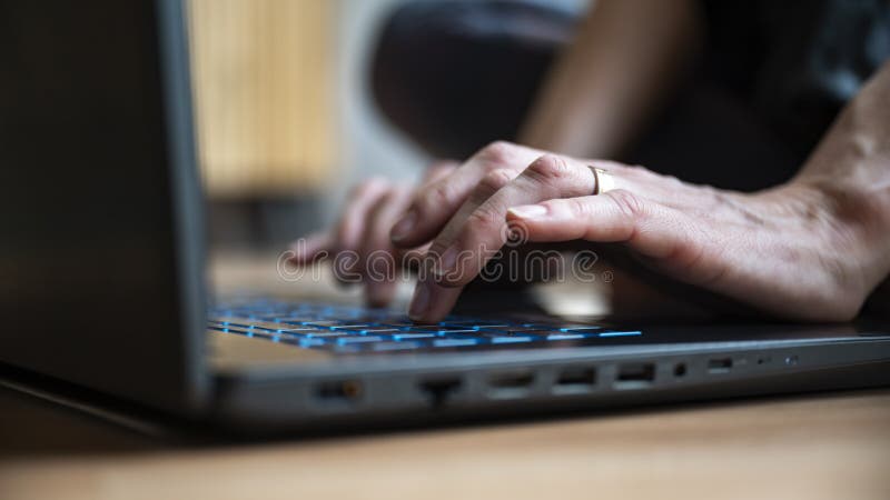 Low Angle Closeup View of Female Hands Using Laptop Computer Stock ...