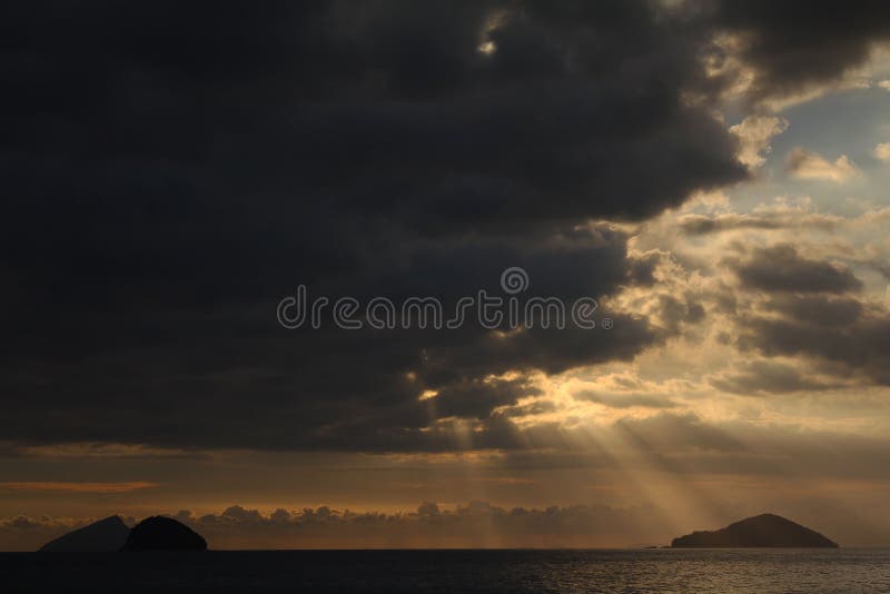 Low-angle of a Cloudy Sky with Sun Rays Illuminating Around Stock Photo ...