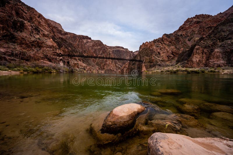Low Angle of the Colorado River and Black Bridge Stock Photo - Image of ...