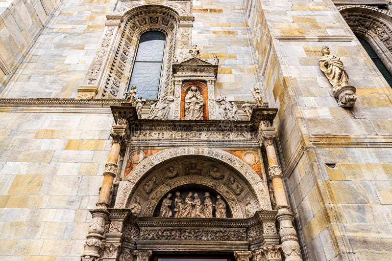 Low Angle of the Como Cathedral Building with Arch Gate and Stone ...