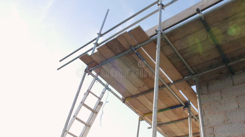 Low Angle of Construction Site and Scaffolding on Side Building Under ...