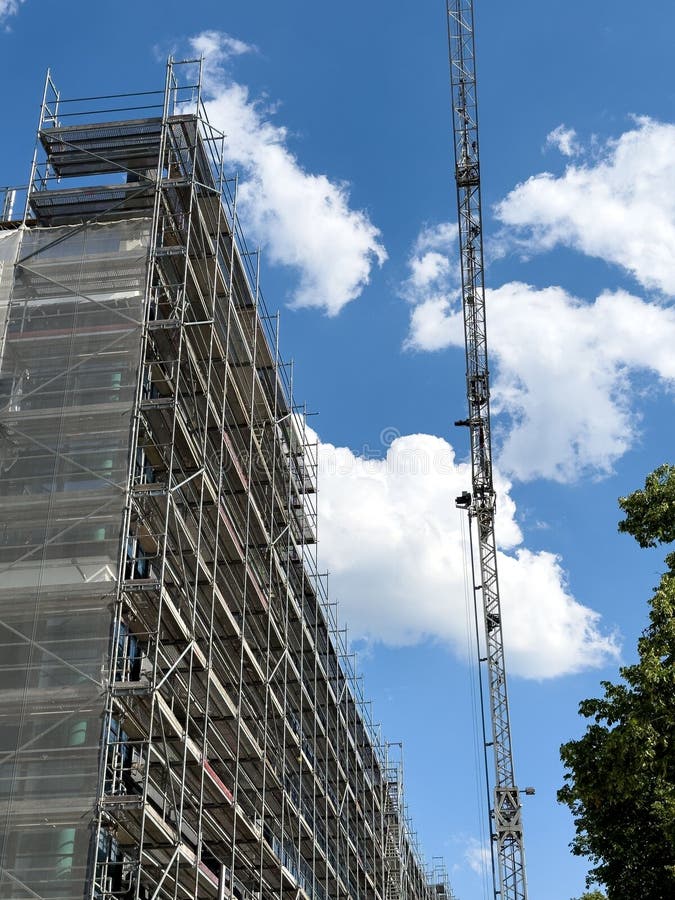 Low Angle of a Crane at a Construction Site Stock Photo - Image of ...