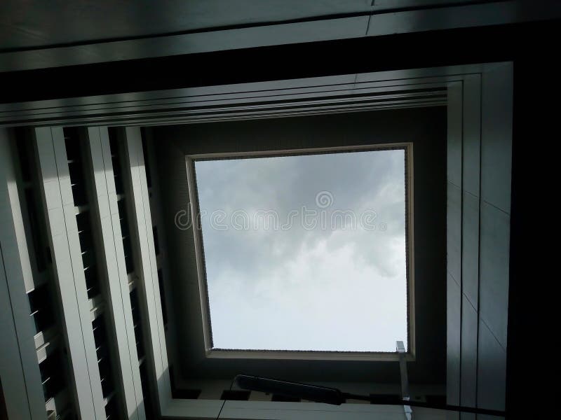Low-angle, Full Shot of a Square Skylight. the Open Area within a Multi ...
