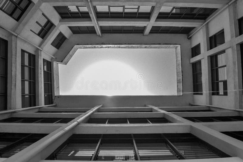 Low Angle Grayscale of a Modern Building Roof with Glass Windows Stock ...