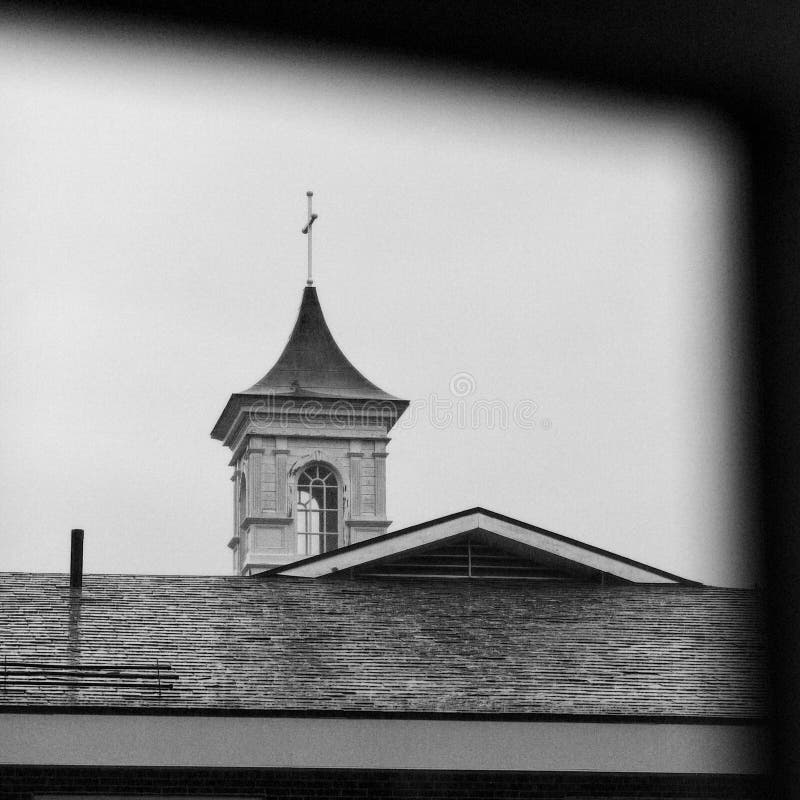 Low Angle Grayscale Shot of a Church with a Cross on Top Stock Photo ...