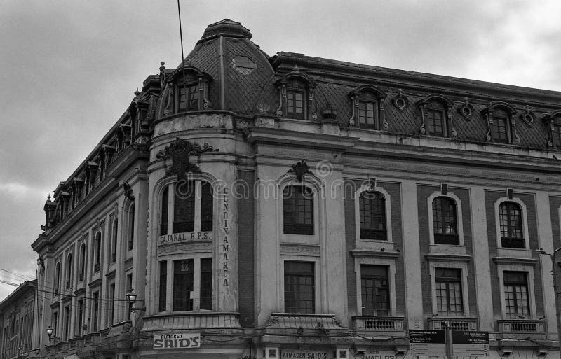 Low Angle Grey Scale Shot of an Old Beautiful Building Underneath the ...