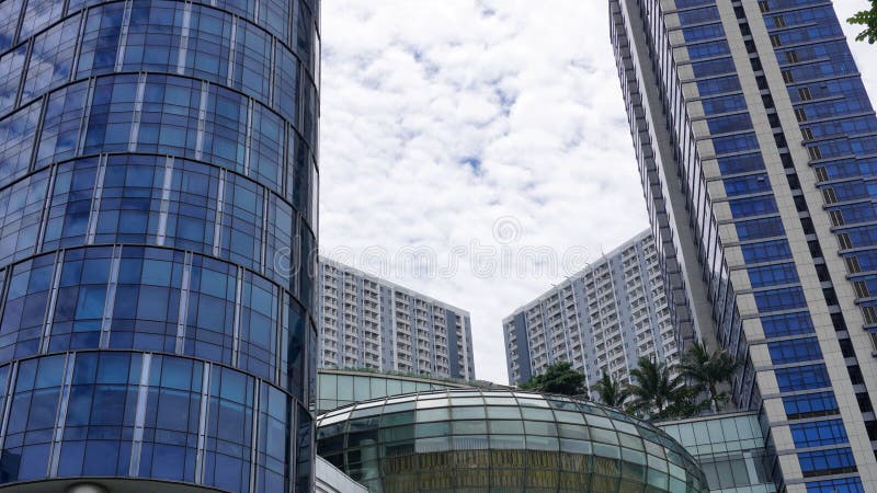 Low Angle High Tower Building with Beautiful Cloud Sky Background Stock ...