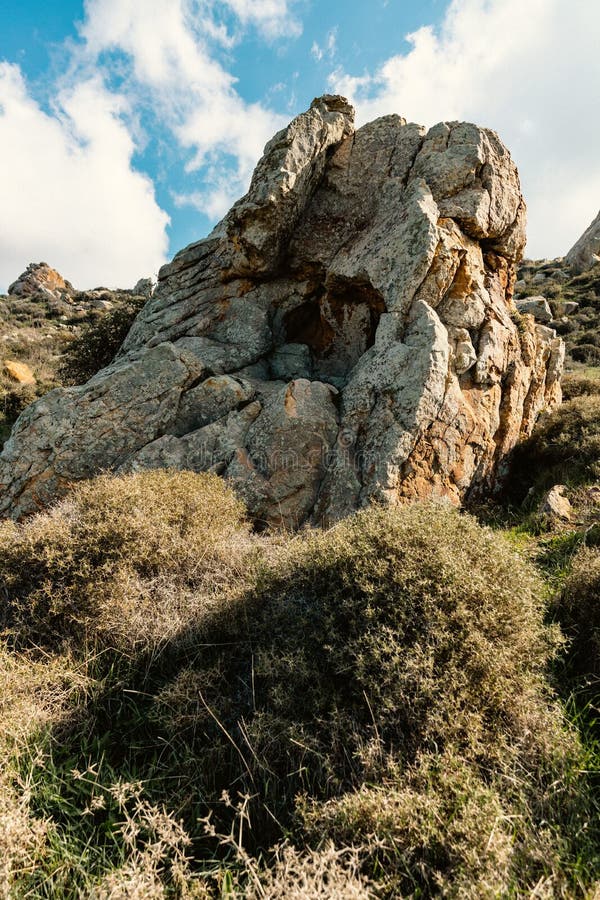 Low Angle of a Hill with Heavy Gray Cliff and Grass during the Daytime ...