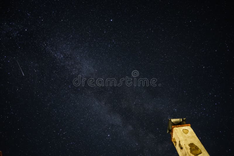 Low Angle of a Lighthouse at Night, with a Dark Stary Sky in the ...