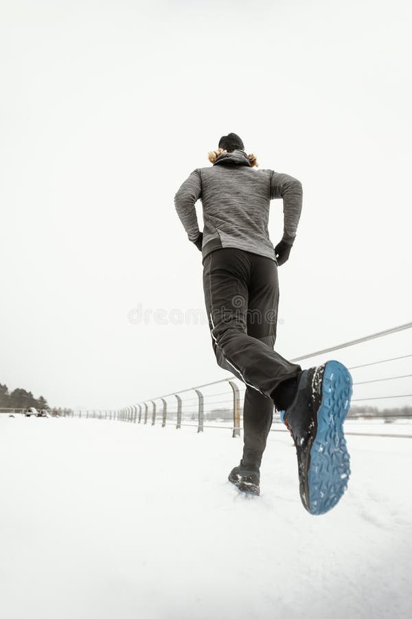 Low Angle Man Running Outdoors. High Quality Photo Stock Image - Image ...
