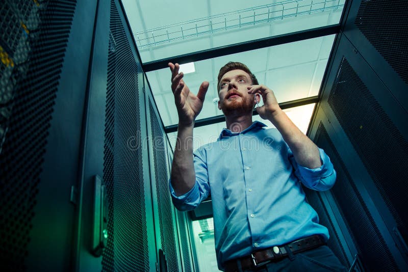 Low Angle of a Nice Busy Young Man Stock Photo - Image of electronic ...