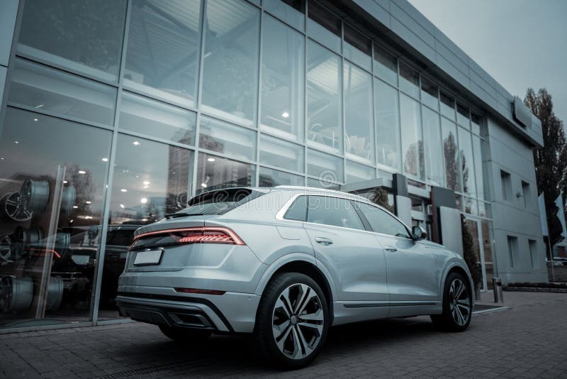Low Angle of Nice Silver Hatchback Car Leaving the Car Salon Stock ...