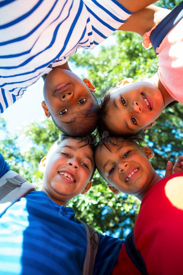 High Angle Portrait of Children Forming Huddle Stock Image - Image of ...