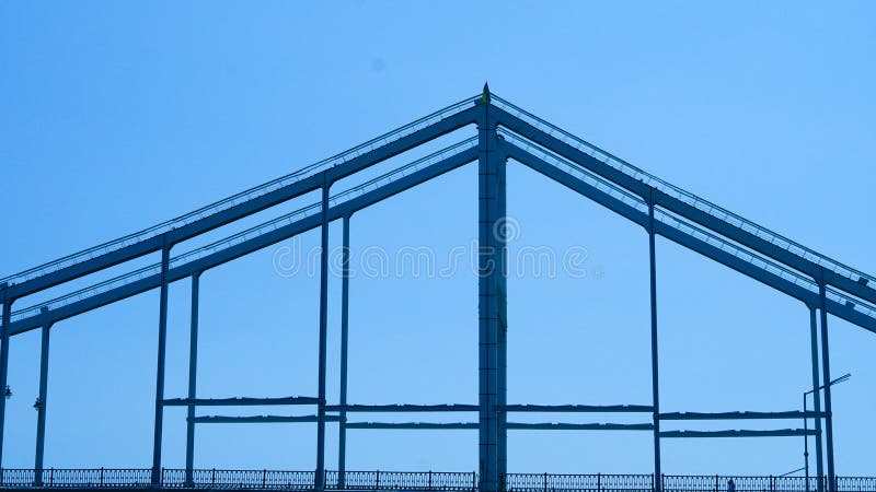 Low Angle Profile of Pedestrian Bridge Showing Minimalist Steel Frame ...