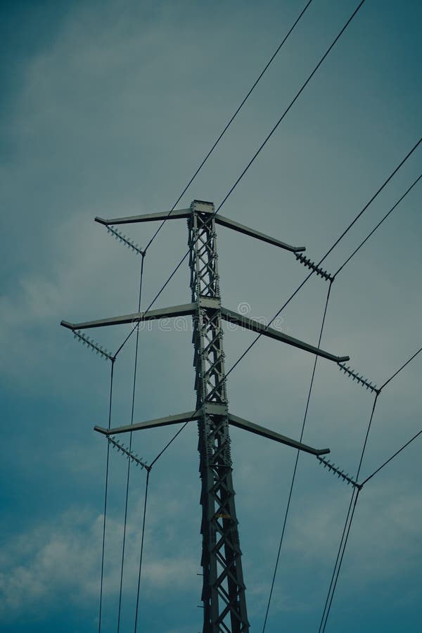Low Angle of a Pylon Tower Supporting Electrical Cables Against the ...