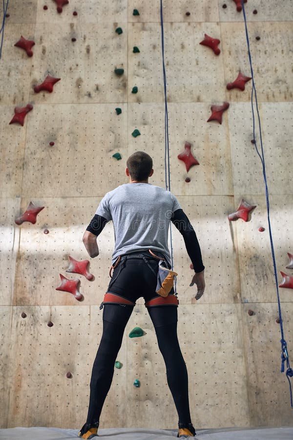 Muscled Boulderer with Physical Disability Standing in Front of ...
