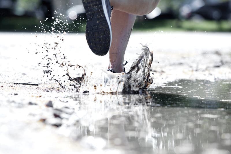 Female Runner Mud Puddle Stock Photos - Free & Royalty-Free Stock ...